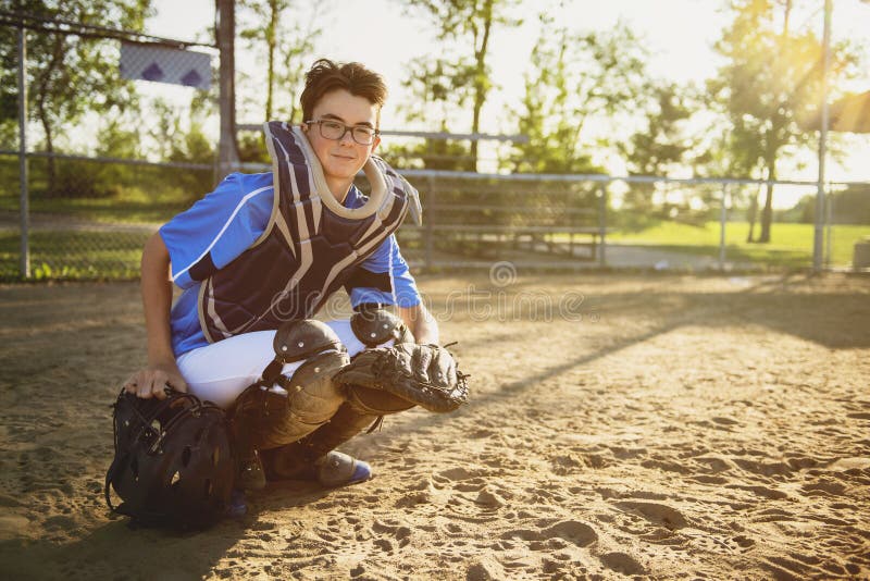 A Children Baseball Catcher Players Standing on the Playground Stock ...