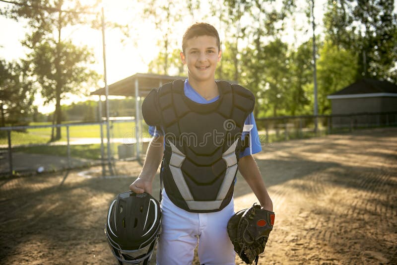 A Children Baseball Catcher Players Standing on the Playground Stock ...