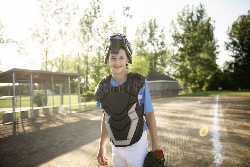 A Children Baseball Catcher Players Standing on the Playground Stock ...
