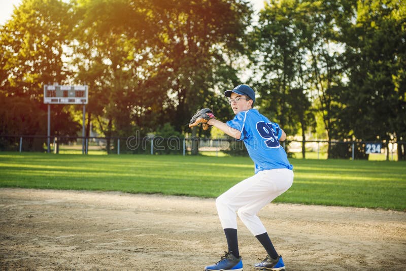 A Children Baseball Players Standing on the Playground Stock Image ...