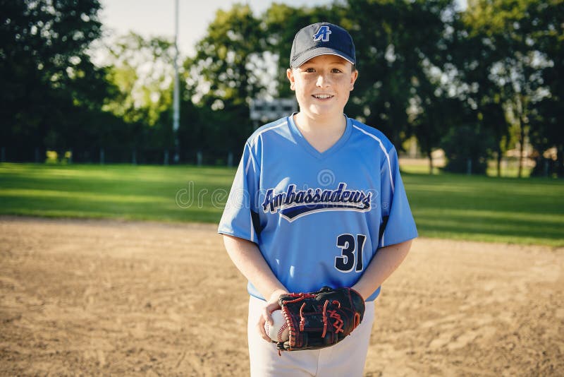 A Children Baseball Players Standing on the Playground Stock Photo ...