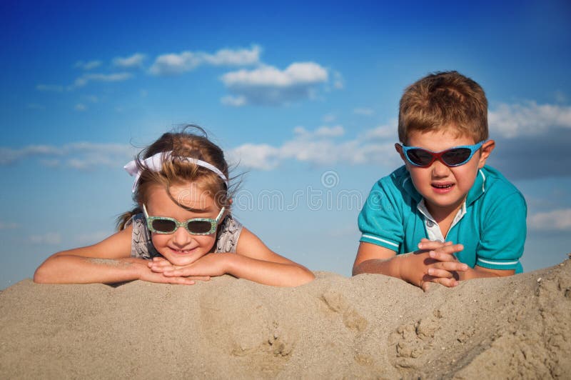 Children on the beach stock image. Image of holiday, people - 25661729