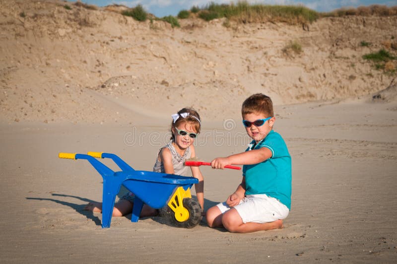 Children on the beach stock photo. Image of outdoor, female - 25661748