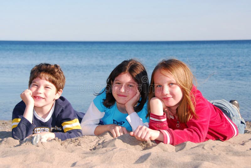 Children on a beach stock photo. Image of sibling, beach - 758572