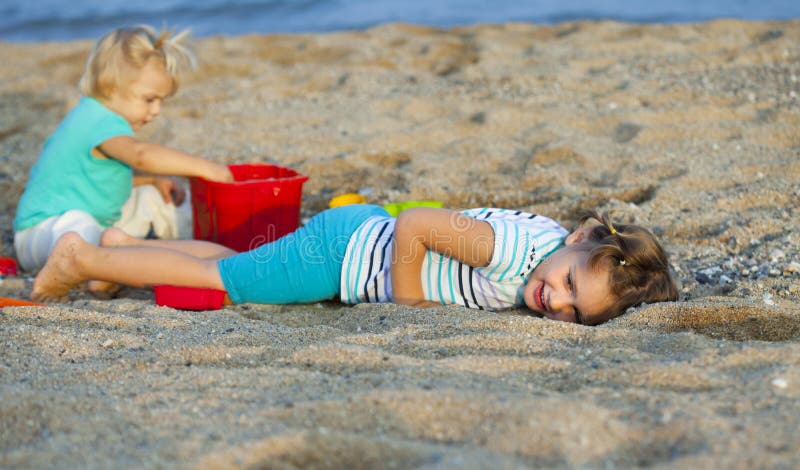 Children on beach stock photo. Image of beach, childhood - 61053958