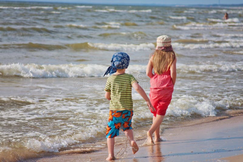 Children on beach stock image. Image of outdoors, children - 43149177