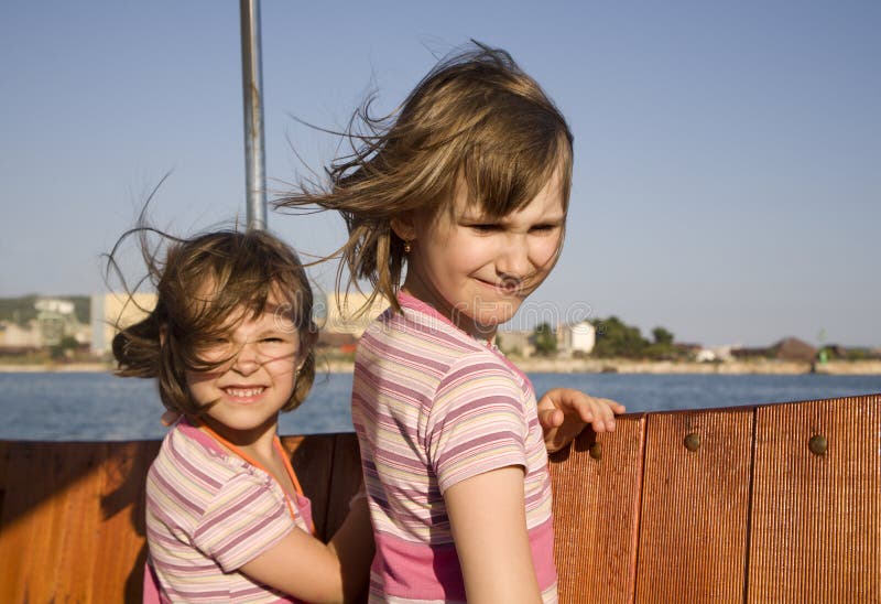 Children on the Boat in the Wind Stock Photo - Image of cheer, water ...