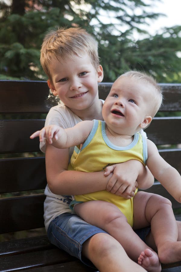 Children Brothers Sitting on Bench Stock Image - Image of beautiful ...