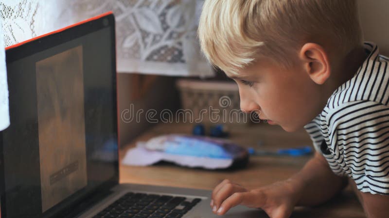 Children are Browsing Photos on a Laptop. Stock Photo - Image of ...