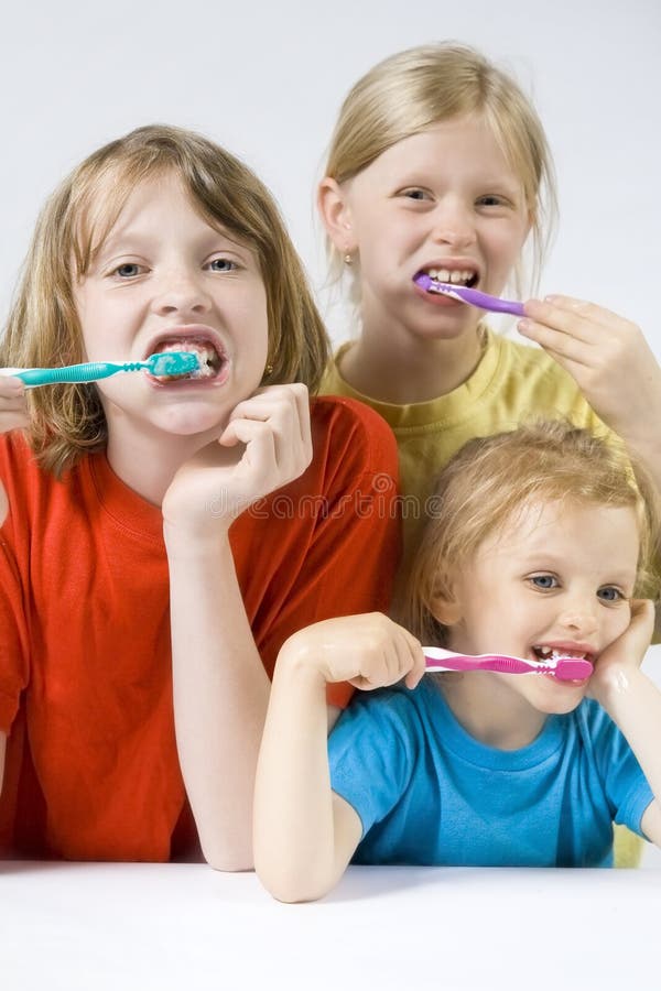 Children brushing teeth stock image. Image of white, sibling - 5586617