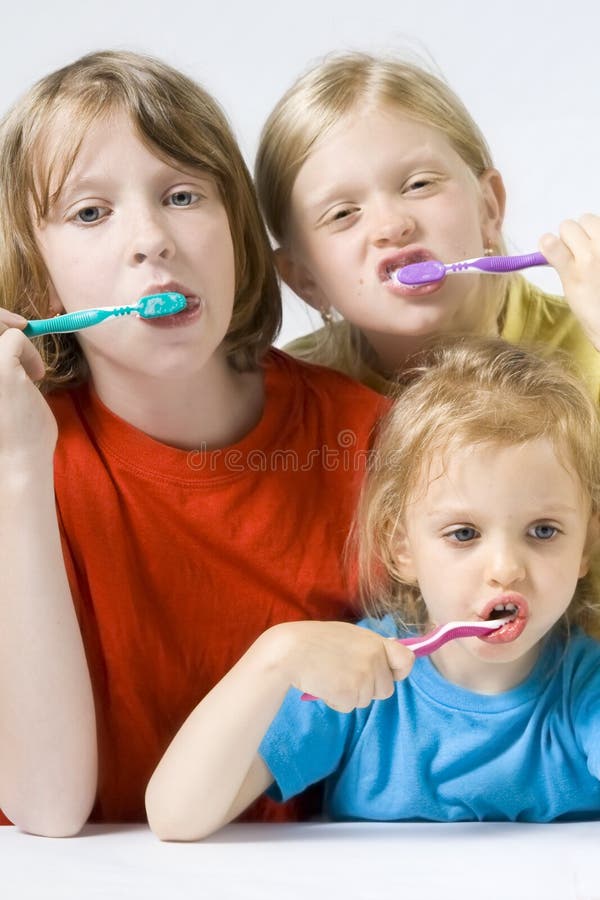 Children brushing teeth stock image. Image of girl, friend - 5626083