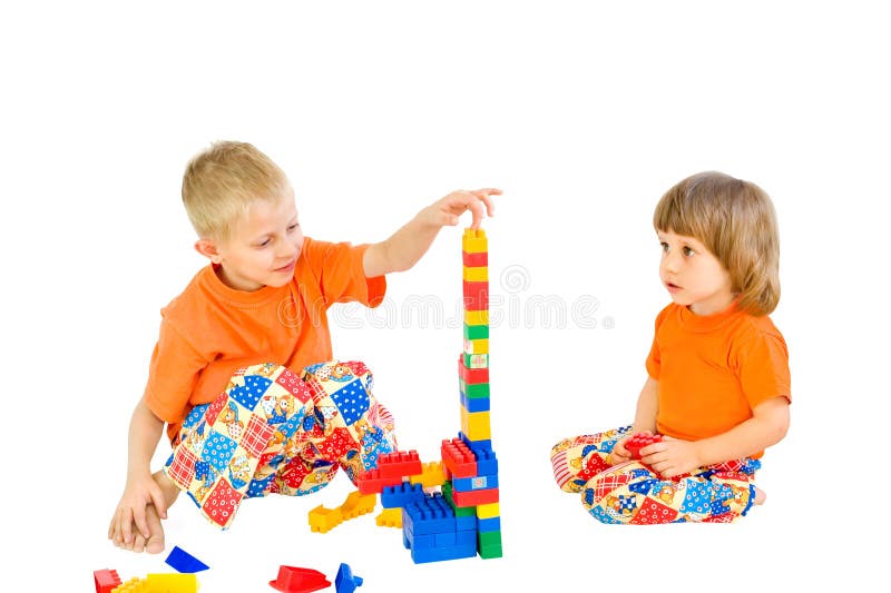 Children Build Tower of Wooden Blocks on the Table Stock Image - Image ...