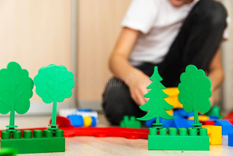 Children Built Out of the Park. Boy and Girl are Playing Constructor ...