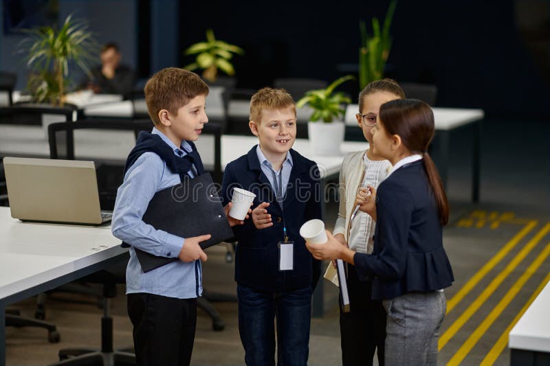 Children Business Team Discussing Work in Office Stock Photo - Image of ...