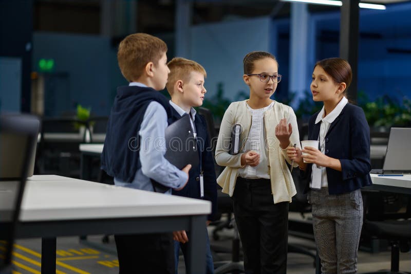 Children Business Team Discussing Work in Office Stock Photo - Image of ...