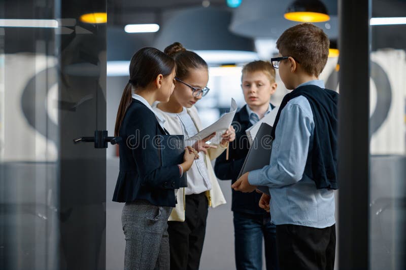 Children Business Team Discussing Work in Office Stock Photo - Image of ...