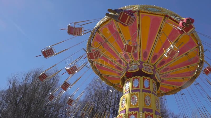 Children S Carousel in an Amusement Park on a Background of Blue Sky ...