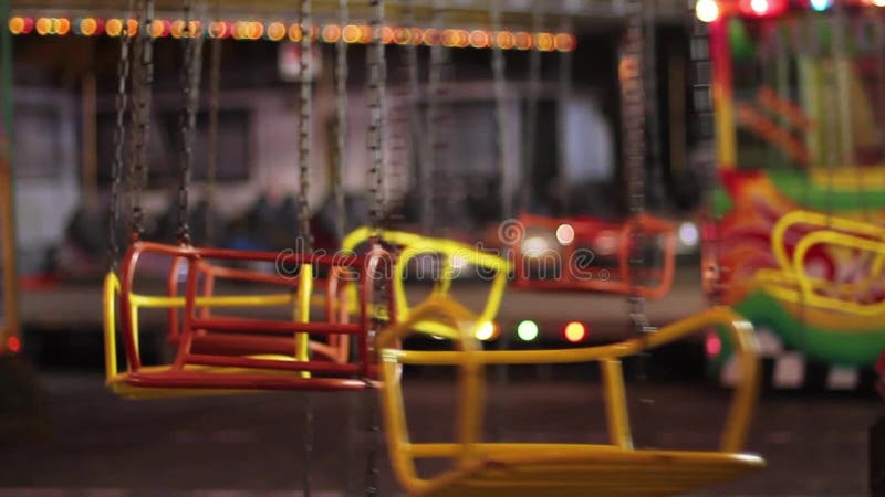 The Chain Carousel Spins in a Circle. Amusement and Recreation Park ...