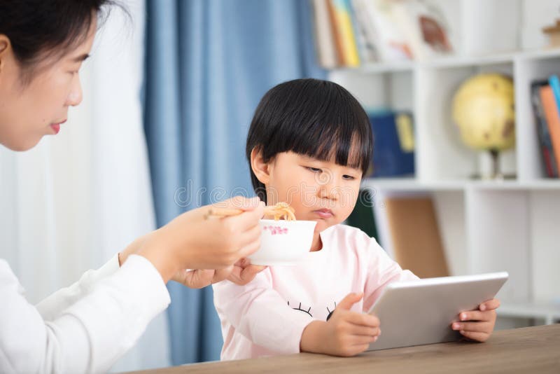 Children in Class on Tablet while Eating Stock Image - Image of kids ...
