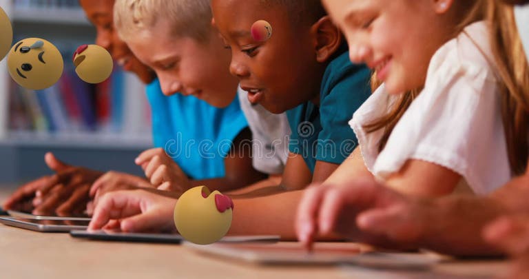 Children in Classroom Using Tablets, Engaging with Interactive Learning ...