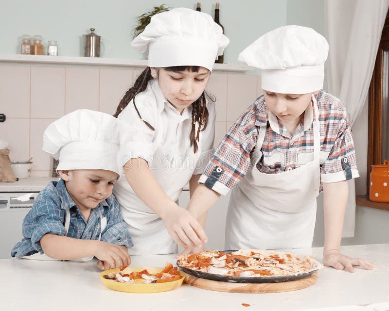 Children in clothes cooks stock image. Image of people - 31495195