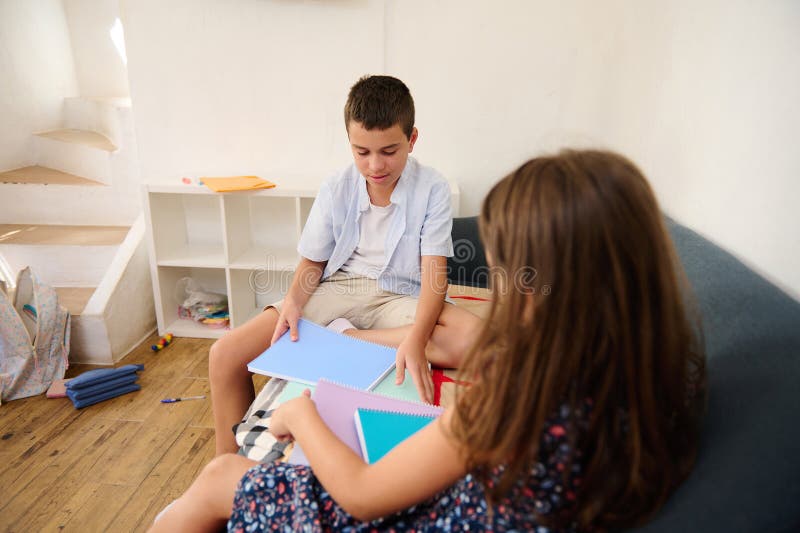 Children Collaborating on Homework Tasks Stock Image - Image of ...
