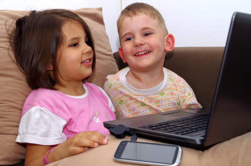 Children of the computer. stock photo. Image of laptop - 30879814