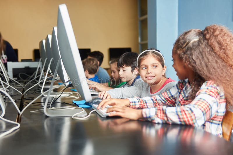 Teacher Using Tablet in Computer Science Class Stock Photo - Image of ...