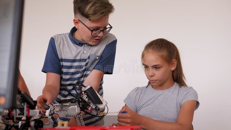 Children Controlling Robots in a Robotics Lesson at School. Stock Video ...