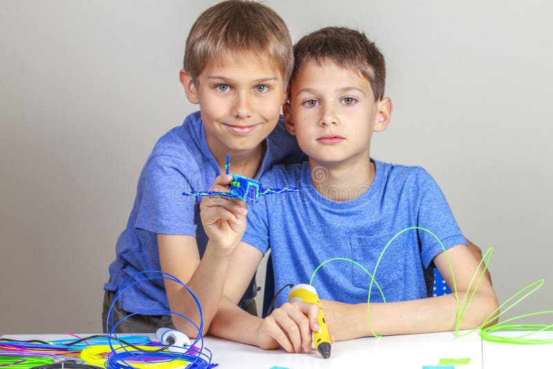 Two Kids Creating with 3d Printing Pens Stock Photo - Image of pencil ...