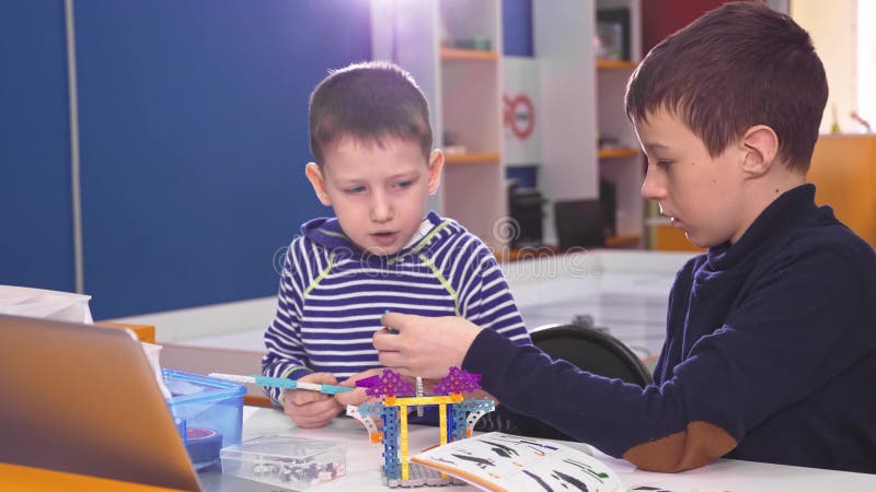 Children Creating Robots at School, Stem Education. Early Development ...