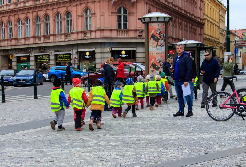 Children cross the street editorial image. Image of precaution - 176243345