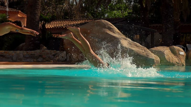 Children Dive into the Pool One after Another Stock Video - Video of ...