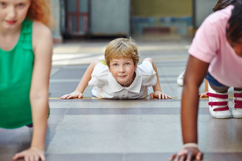 Children Doing Push Ups In PE Stock Photo - Image: 40225578