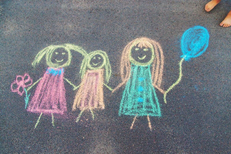 Children Draw with Chalk on the Asphalt. Selective Focus Stock Image ...