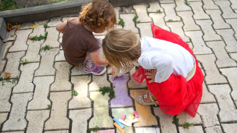 Children Draw with Crayons on the Pavement Stock Footage - Video of ...