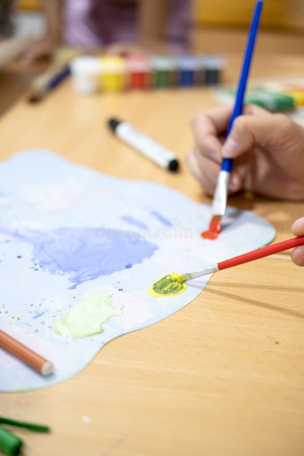 Children Draw on the Poster with Pencils and Paints Stock Photo - Image ...