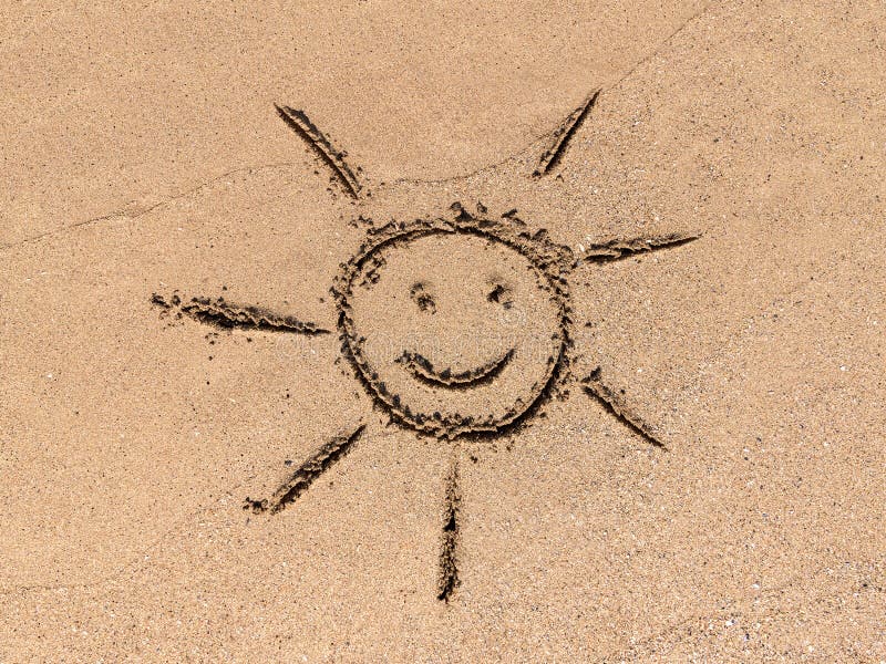 Children Drawing of Sun Sign on Beach Sand Stock Photo - Image of ...