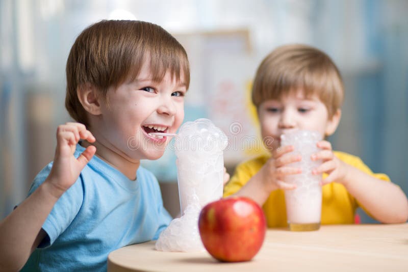 Children Drinking Milk at Home Stock Photo - Image of eating, fruit ...