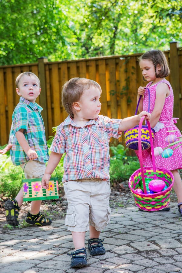 Children on an Easter Egg Hunt Outside Stock Image - Image of game ...