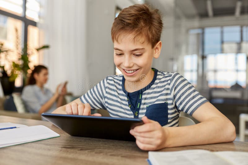 Student Boy with Tablet Computer Learning at Home Stock Photo - Image ...