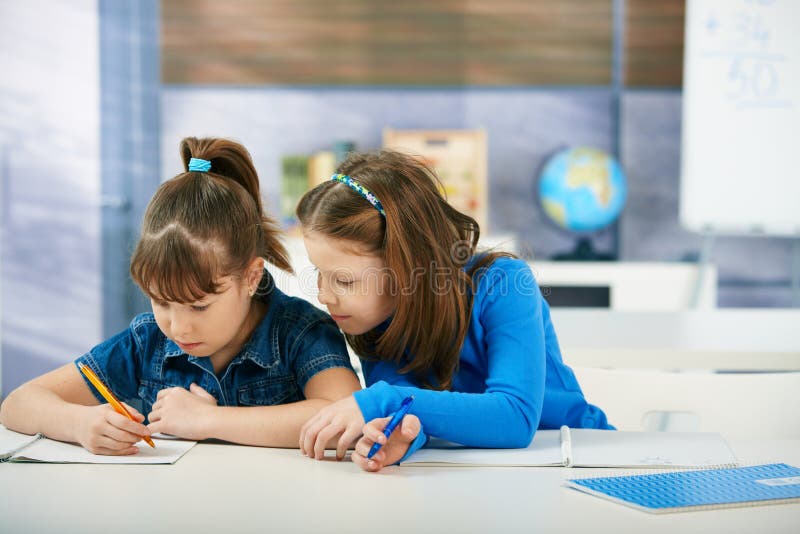 Children in Elementary School Classroom Stock Photo - Image of focusing ...
