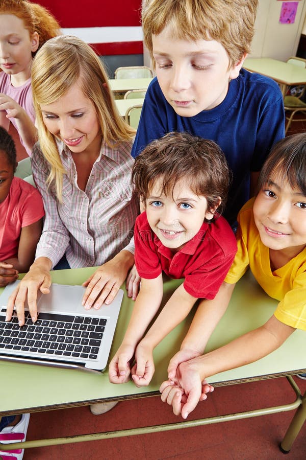 Children in Elementary School with Laptop Stock Photo - Image of ...