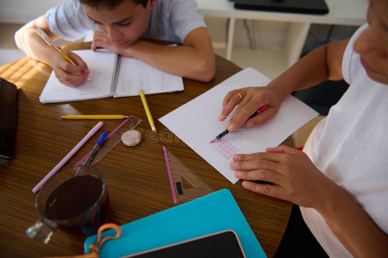 Children Engaged in Home Learning Activities at the Table Stock Photo ...
