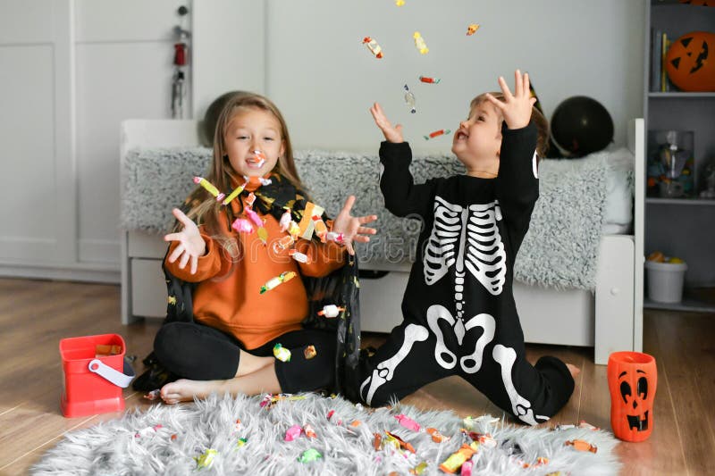Children Enjoy Candy Collected for Halloween Stock Image - Image of ...