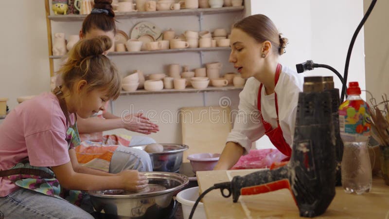 A Young Girl Learns Pottery Skills in a Creative Workshop Setting Stock ...