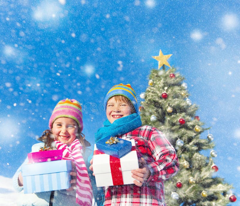 Children Enjoying Their Christmas Presents Stock Photo - Image of ...