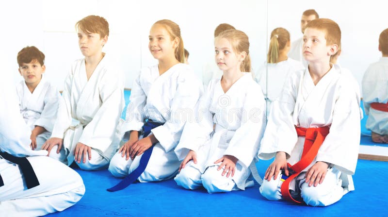 Children Enjoying Their Trainings with Coach at Karate Stock Photo ...