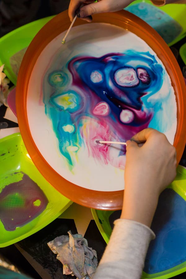 Children Experiment with the Colors in the Dishes Stock Photo - Image ...