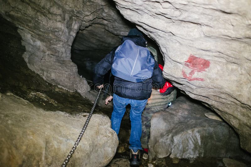 Children Explore Underground Caves, an Underground Karst Complex Stock ...
